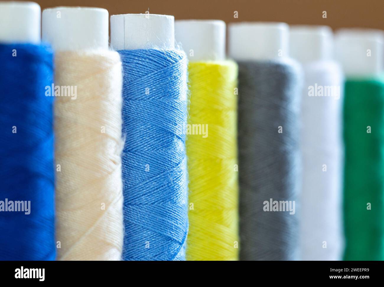 Multi colored threads hi-res stock photography and images - Alamy