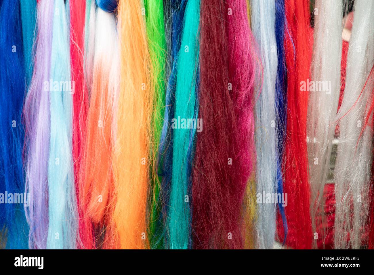 detail of colored wool in rainbow color gives a harmonic background ...