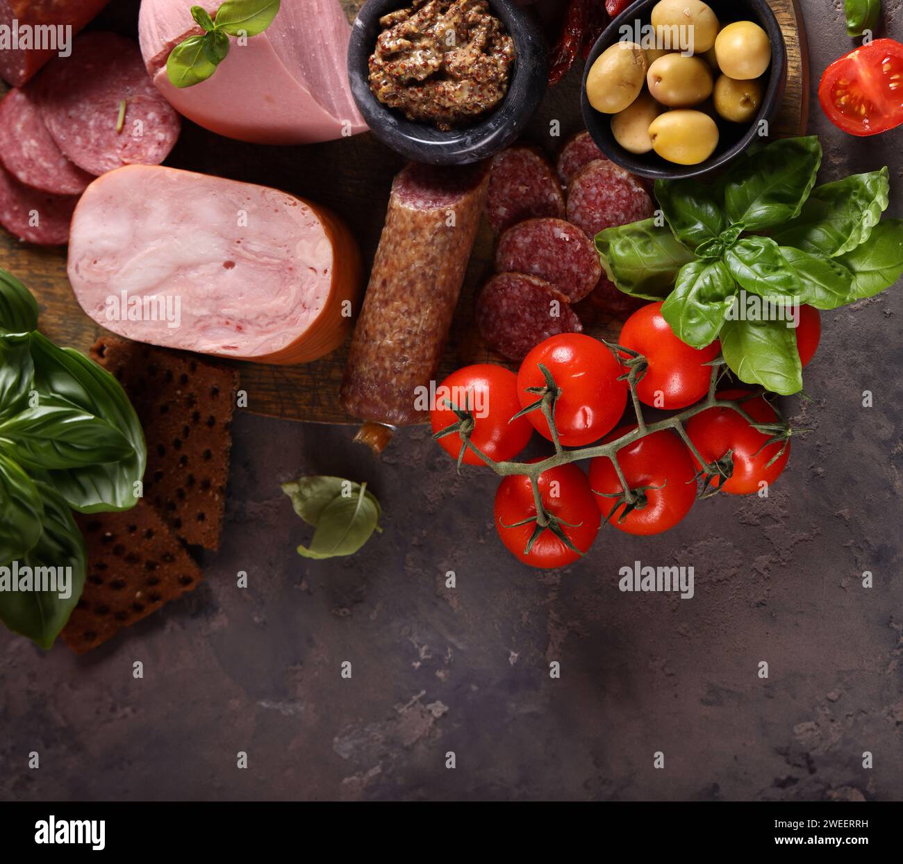 assorted sausages and deli meats for appetizers Stock Photo - Alamy