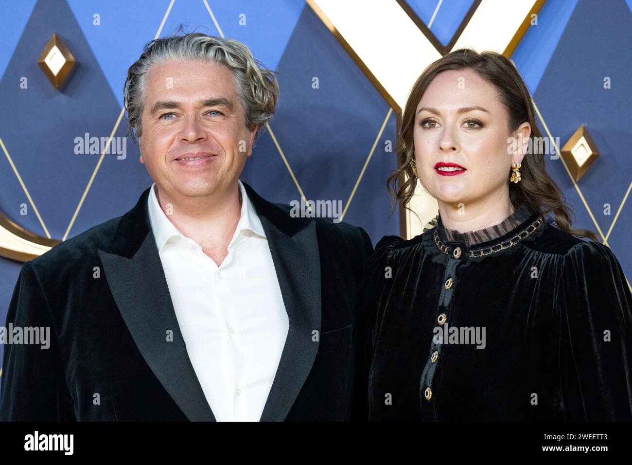 Lorne Balfe, left, and Nina Balfe pose for photographers upon arrival ...