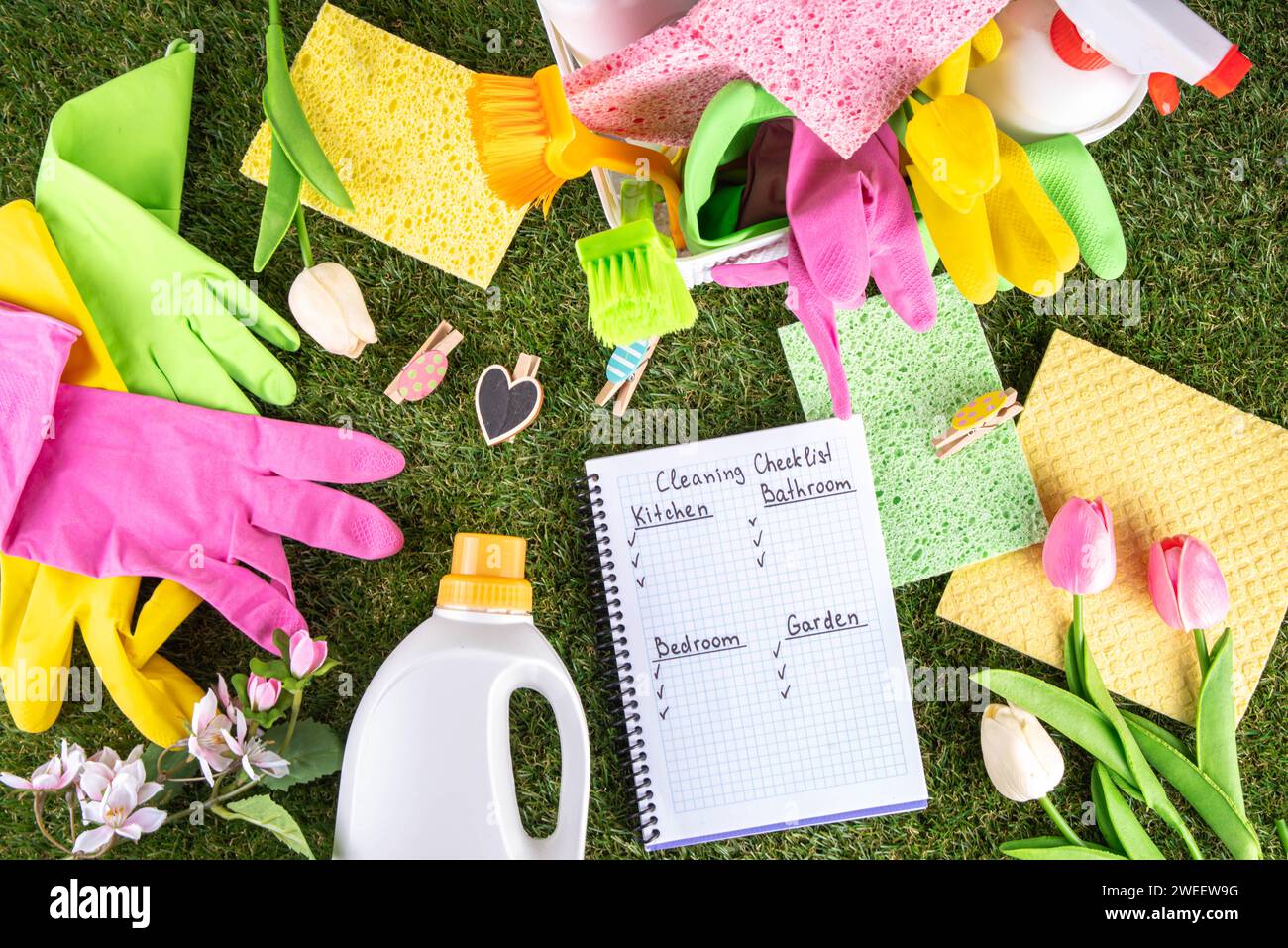 Spring cleaning background. Set of cleaning supplies, bottles ...