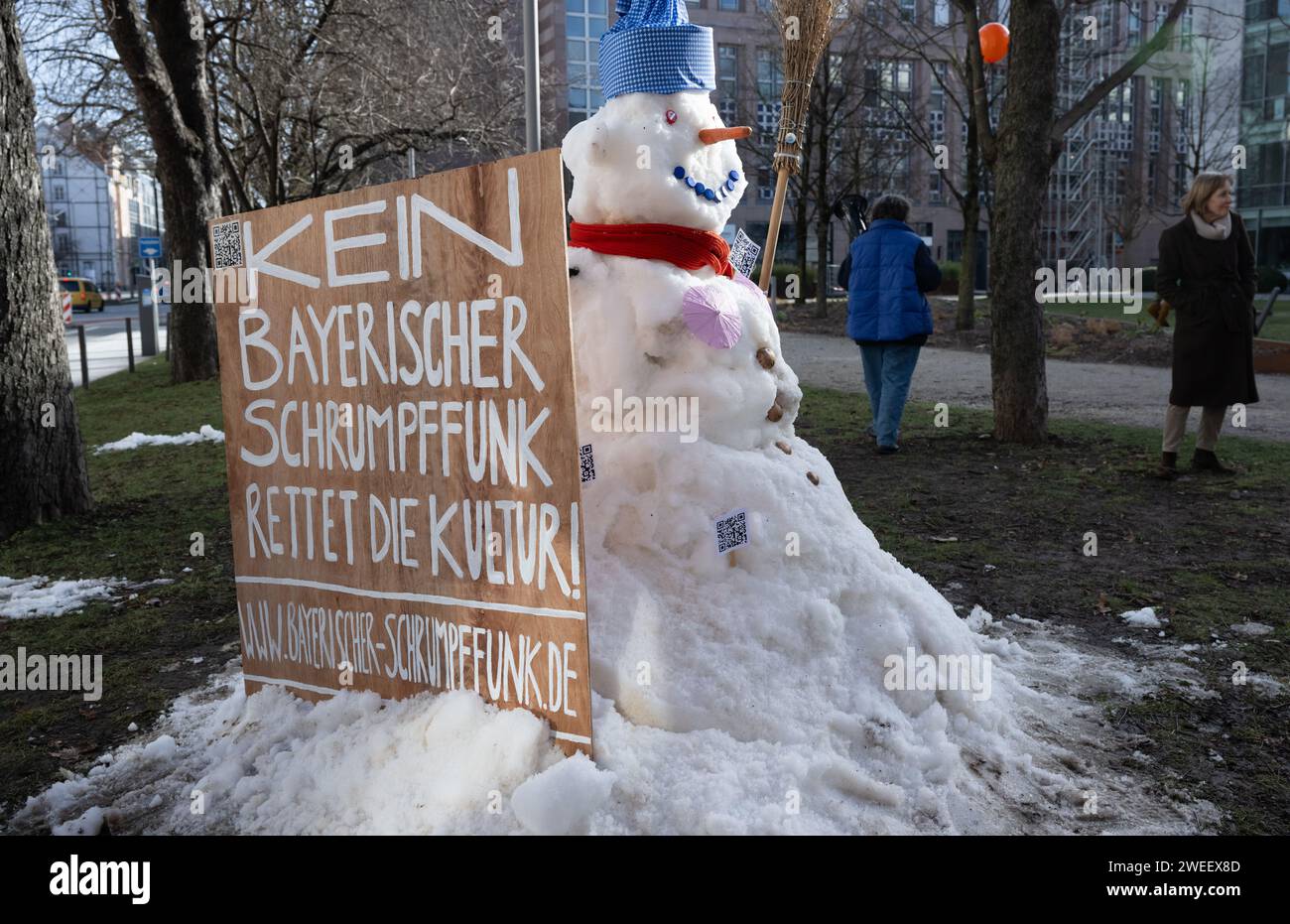 Munich, Germany. 25th Jan, 2024. Cultural workers have built a snowman ...
