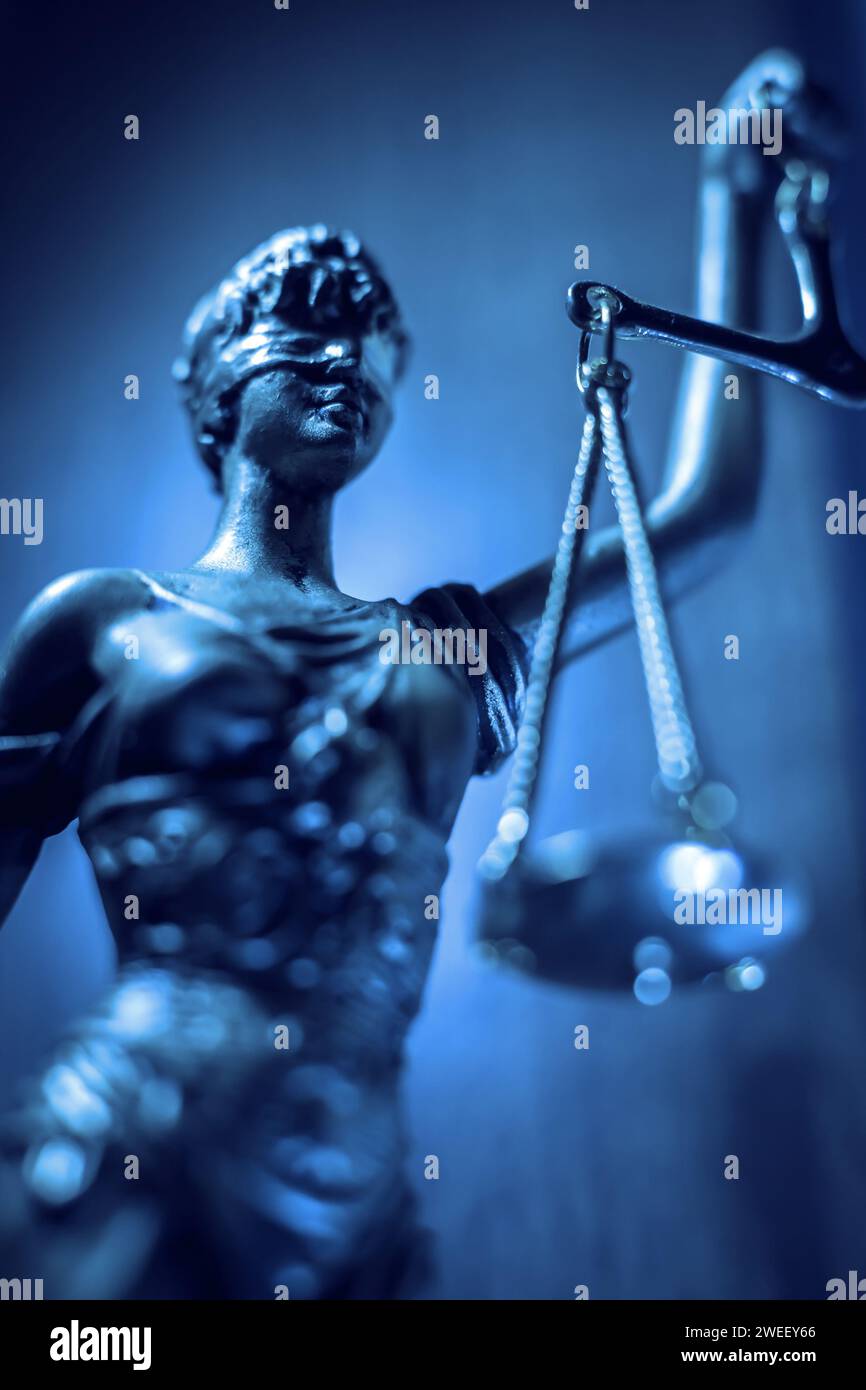 lady justice statue with scales and blindfold on blue background Stock ...
