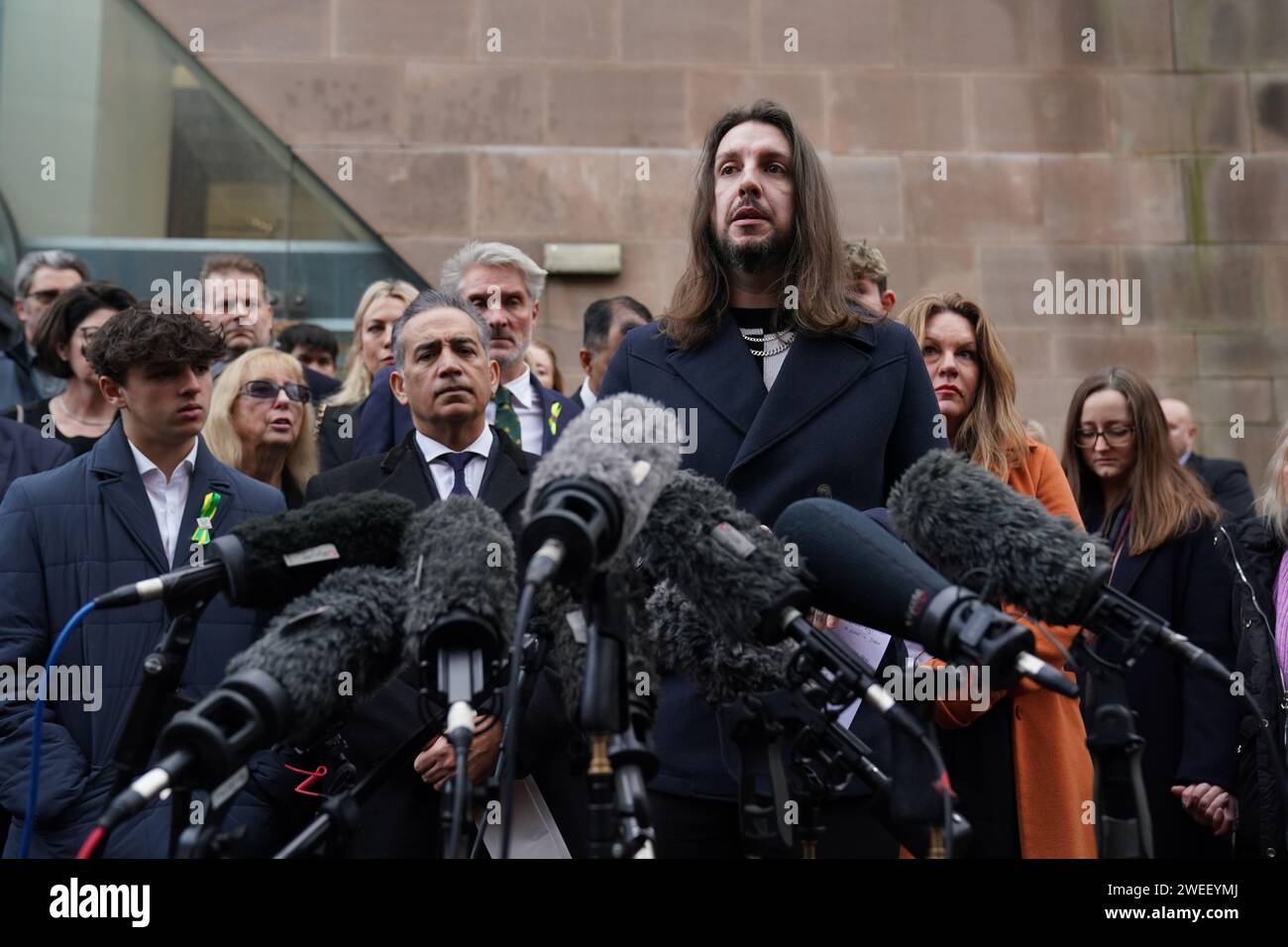 Ian Coates son, James, making a statement alongside relatives of the ...