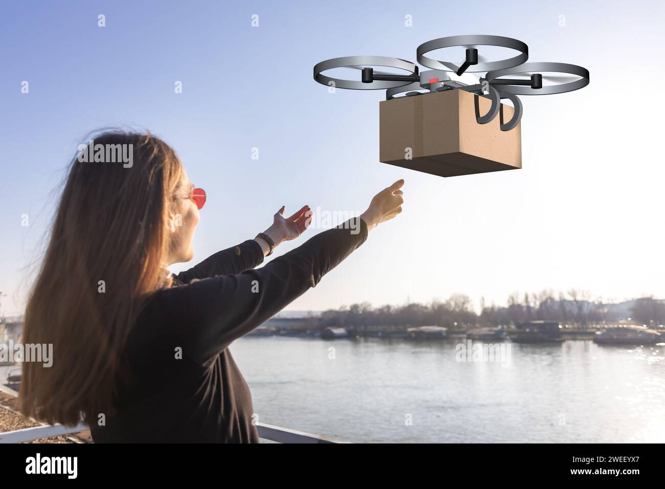 Drone delivering parcel woman hi-res stock photography and images - Alamy