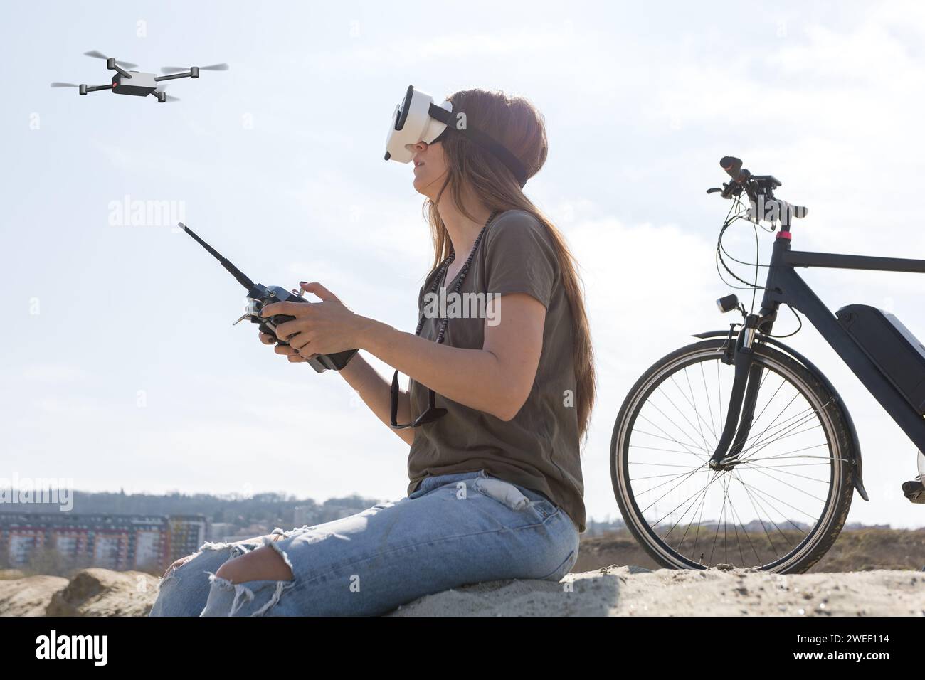 Young woman control drone hi-res stock photography and images - Alamy