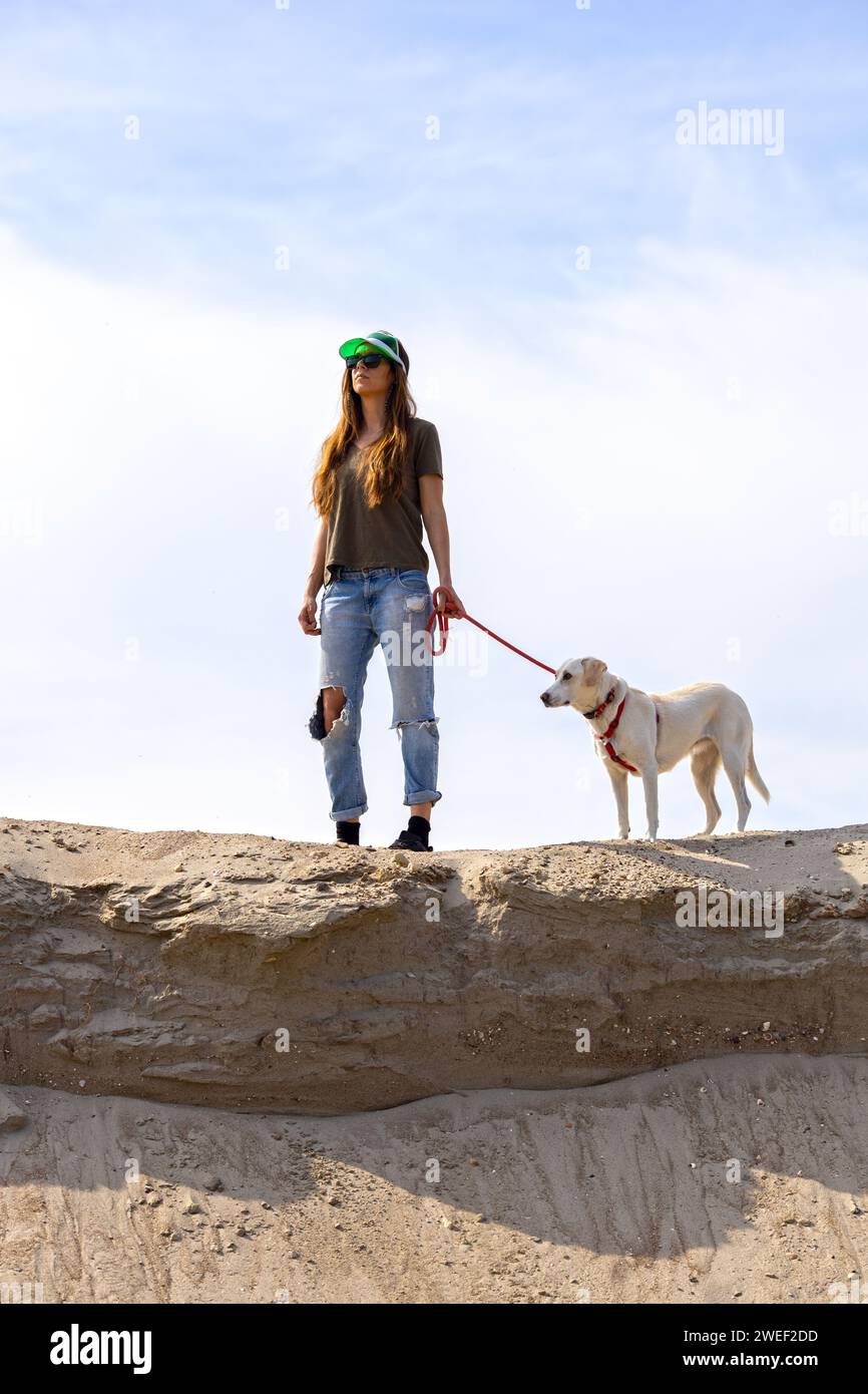 Dog walking in front at a distance hi-res stock photography and images ...