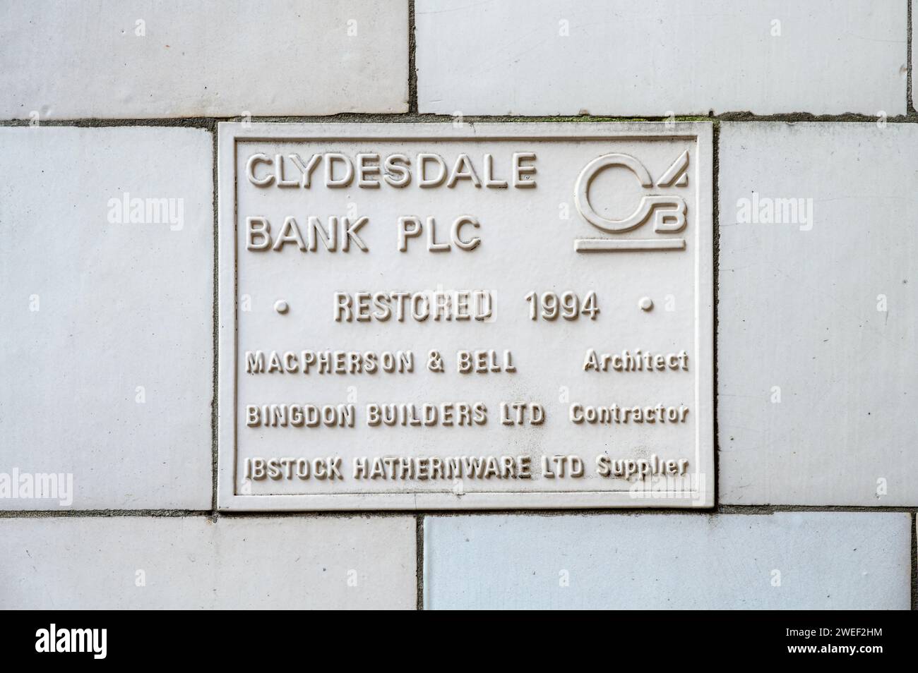An architectural plaque with information about a restored Clydesdale ...
