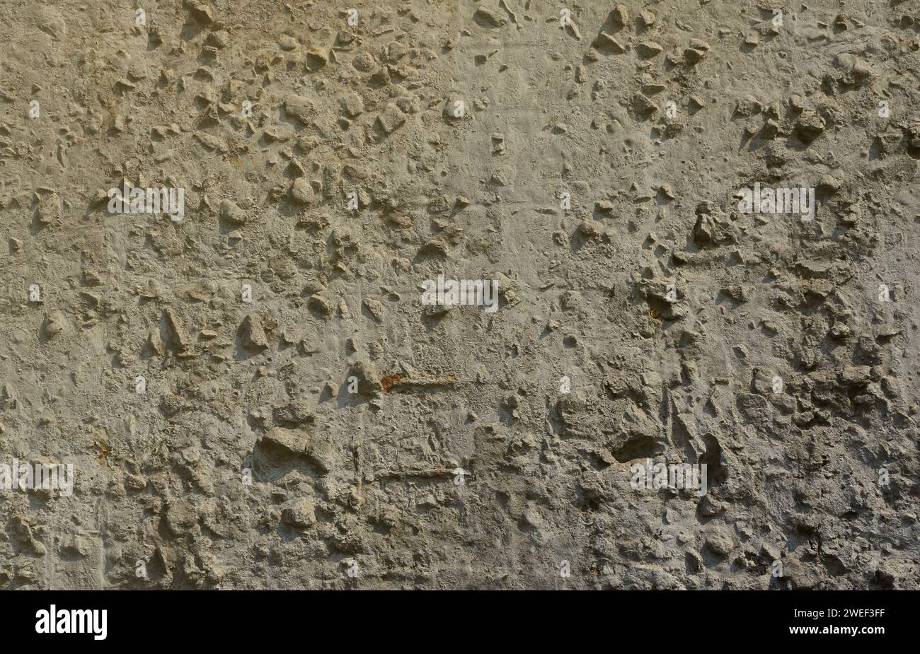Texture of the old embossed concrete wall in gray color. Background ...