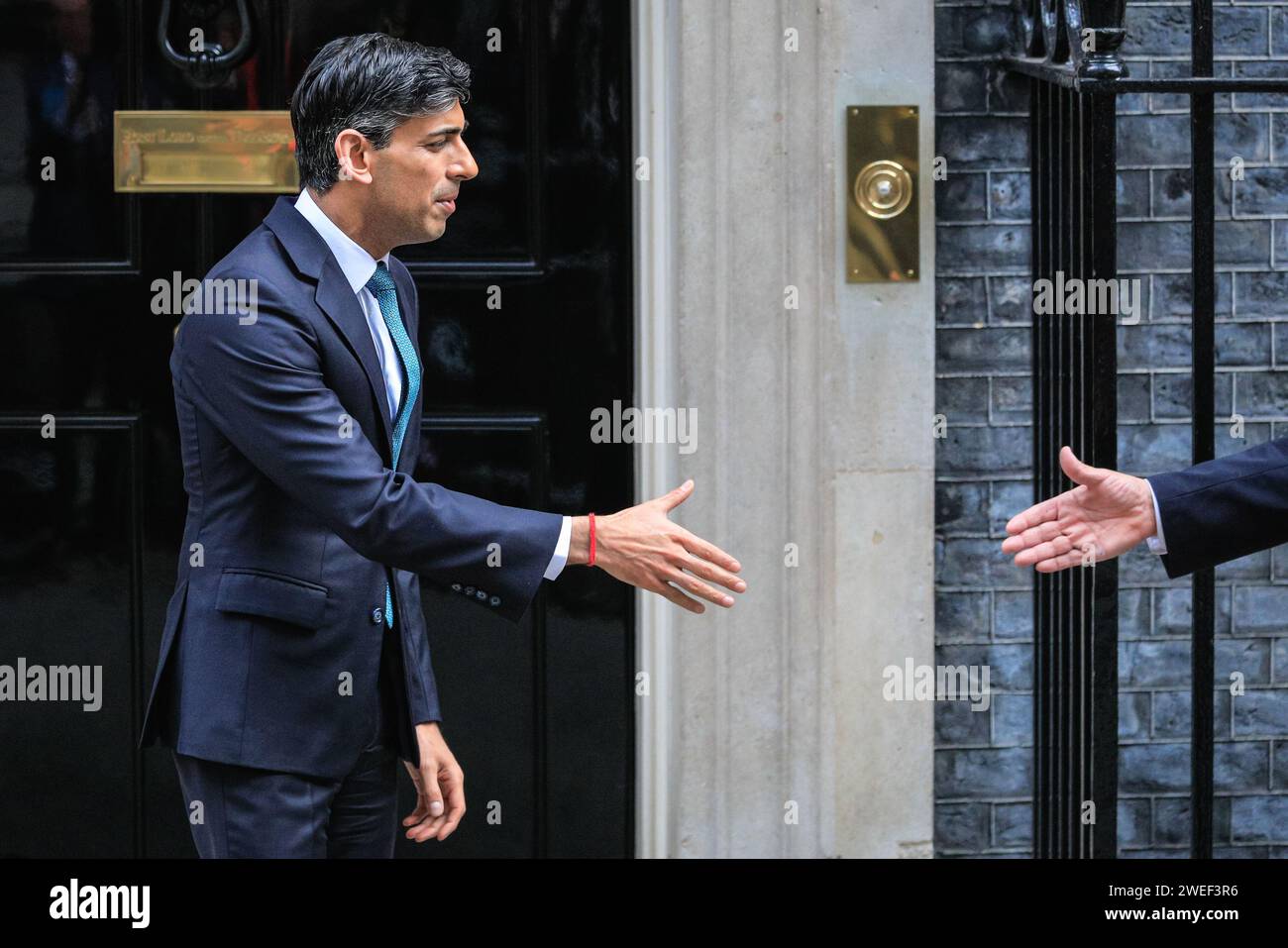 Rishi Sunak, MP, Prime Minister of the United Kingdom, hand stretched out to welcome a visitor ...