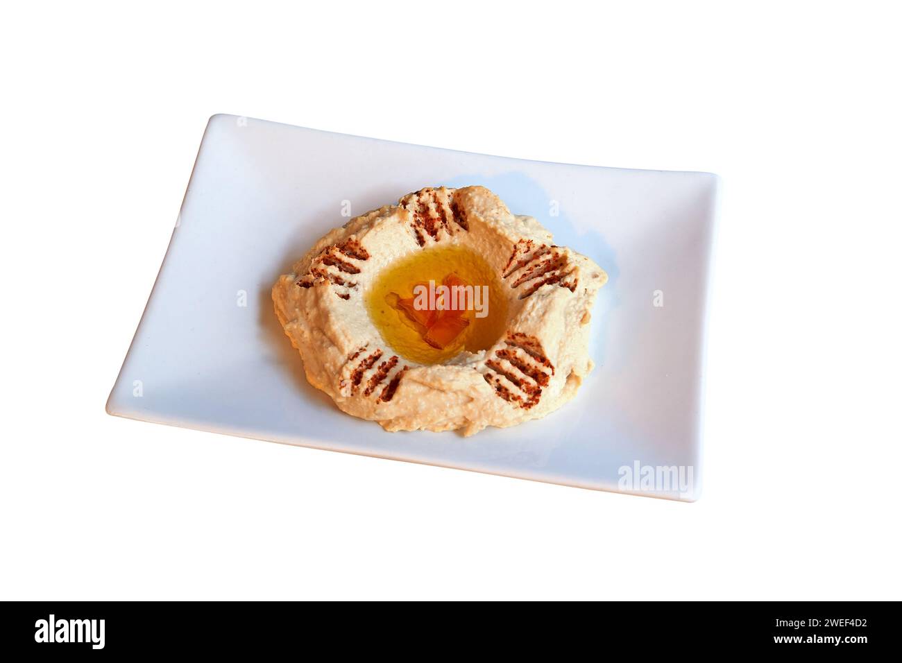 Plate of traditional hommos mezze view from above and isolated with ...