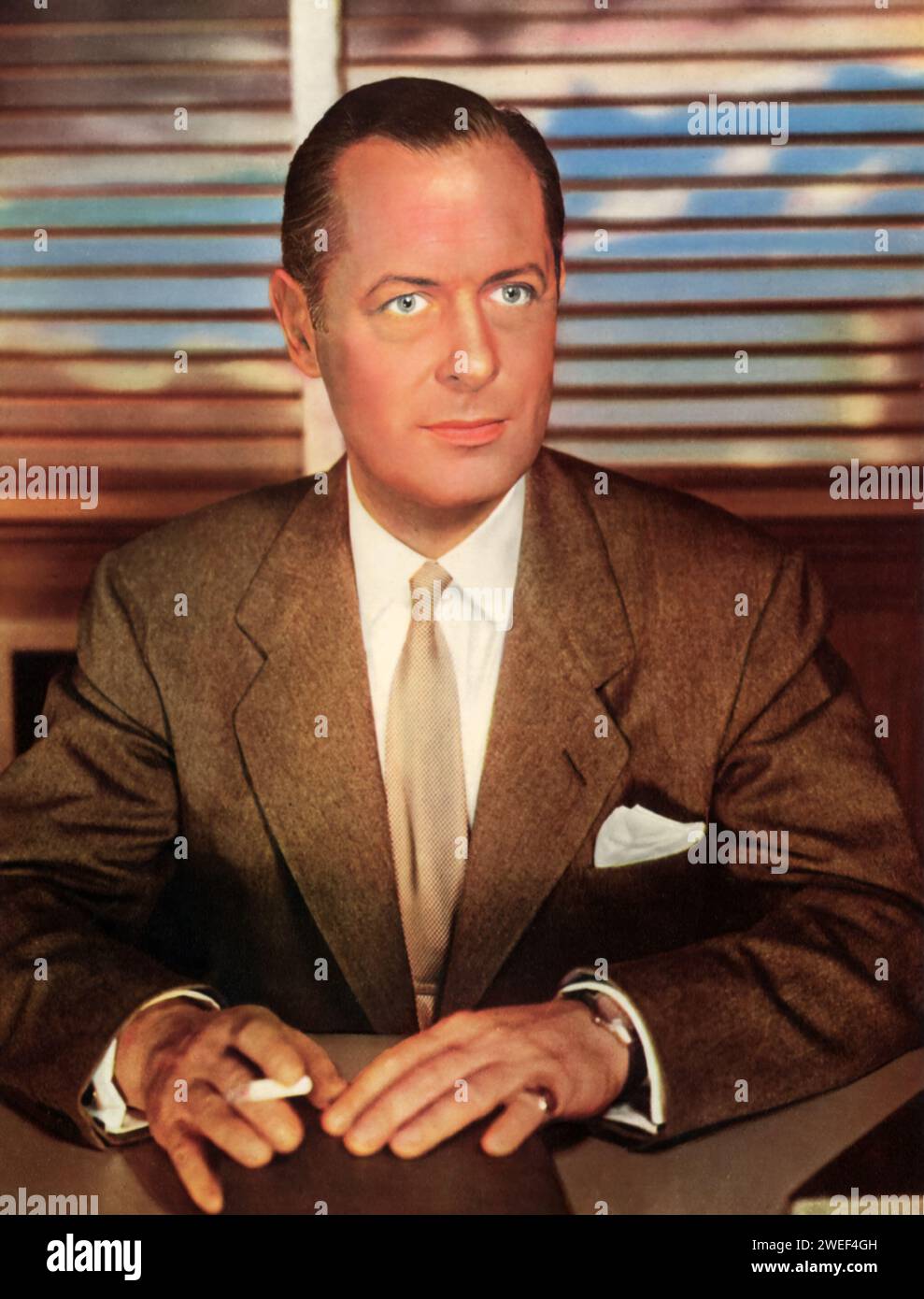 A portrait of Robert Montgomery, celebrated for his roles in films such ...