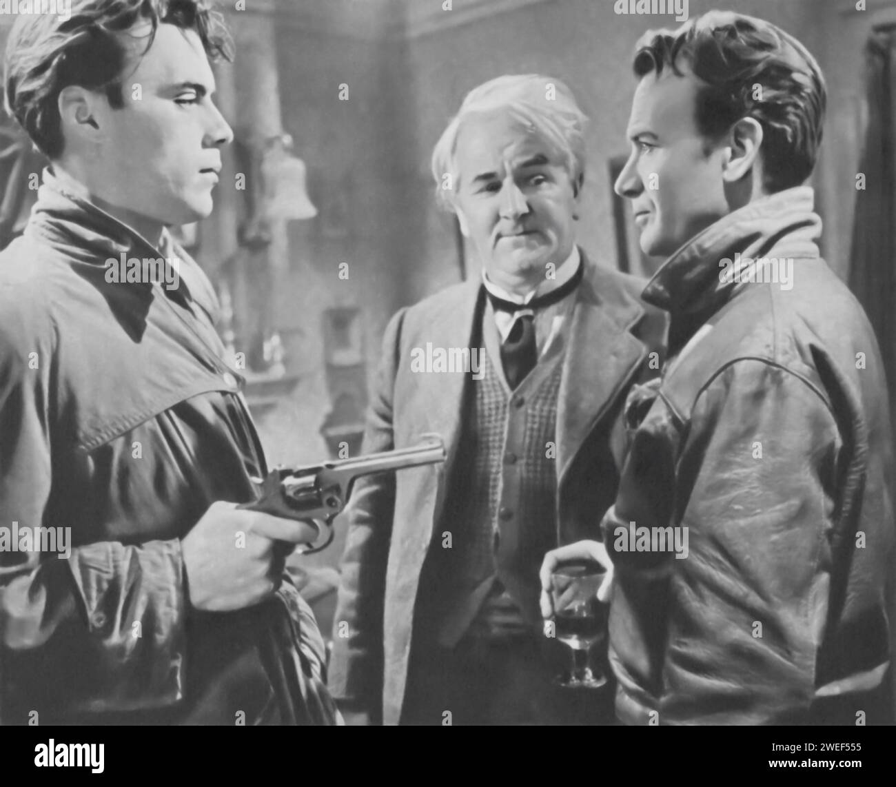 Dirk Bogarde, Joseph Tomelty, and John Mills star in 'The Gentle Gunman ...