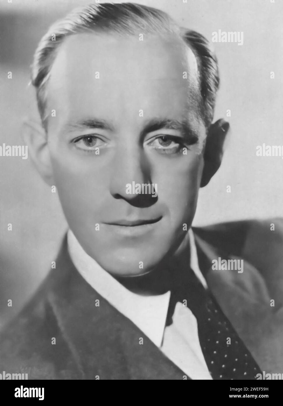 A portrait of Alec Guinness, an esteemed actor celebrated for his ...