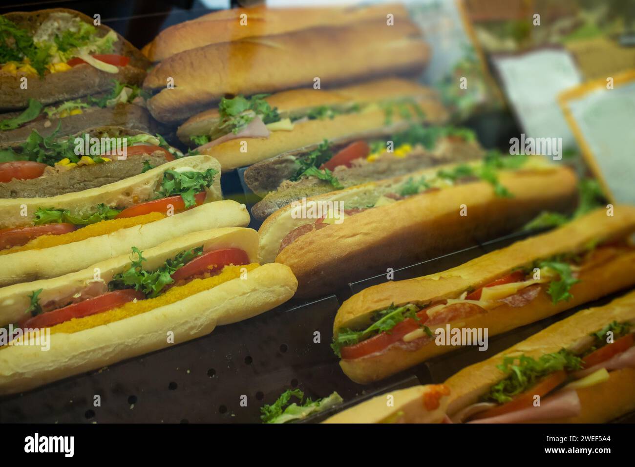 many types of sandwiches displayed in bakery shelf Stock Photo - Alamy