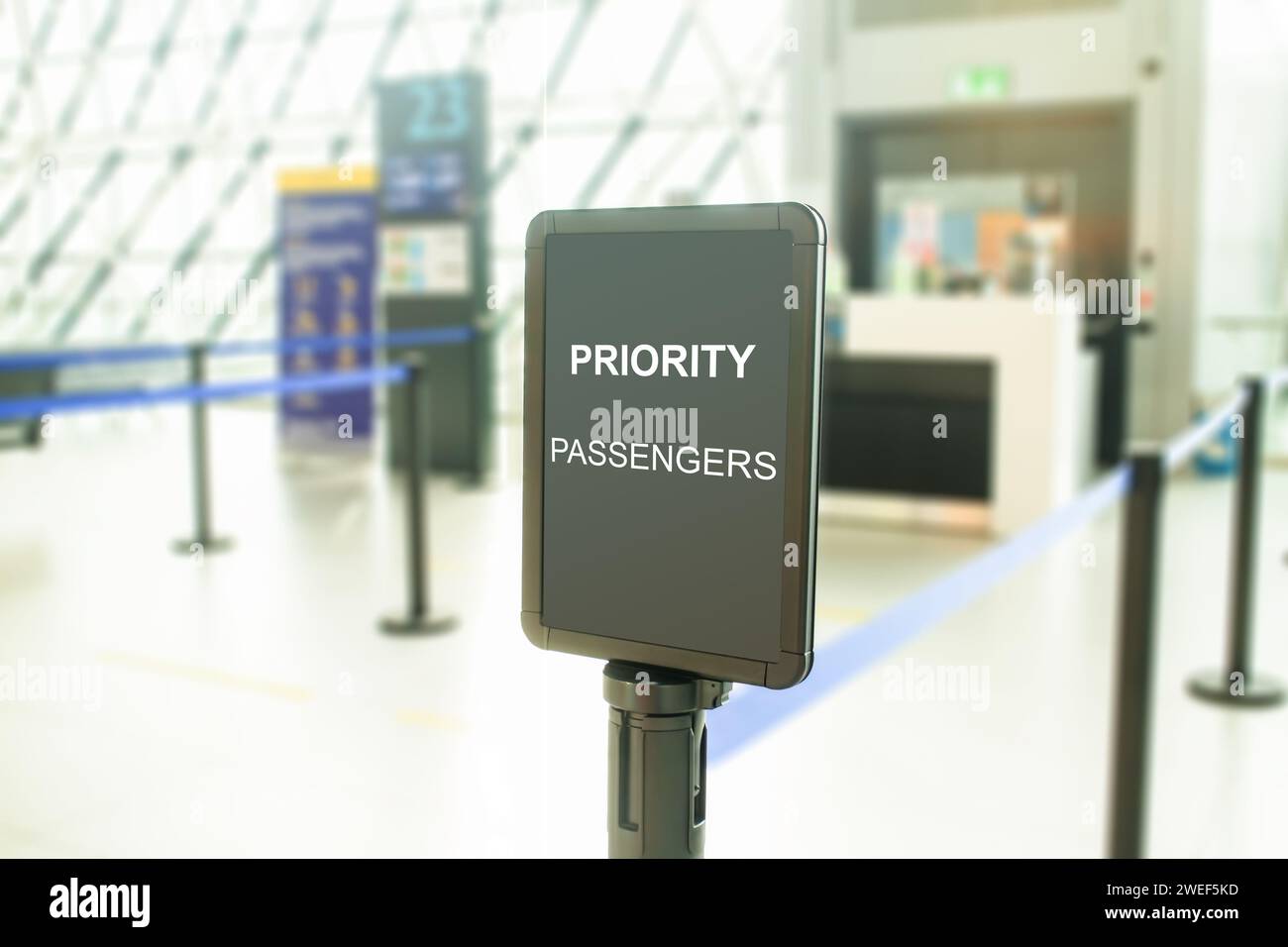 priority passengers sign at airport waiting area Stock Photo - Alamy