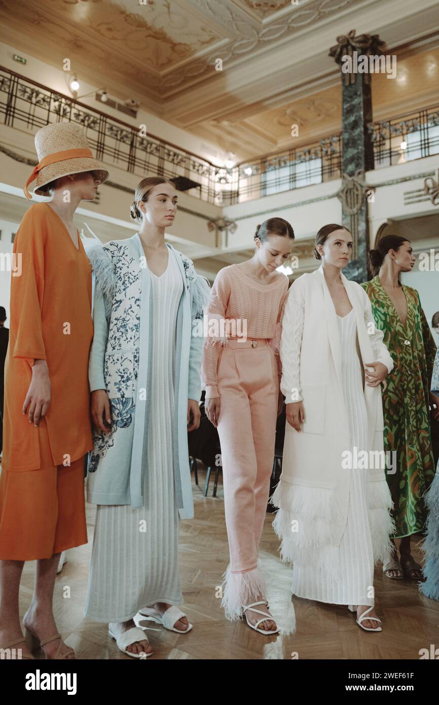 Fashion models in classy designer outfits posing on the backstage ...