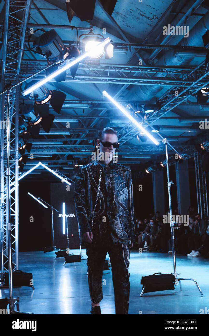 Fashion model young man wearing creative outfit walking the runway ...