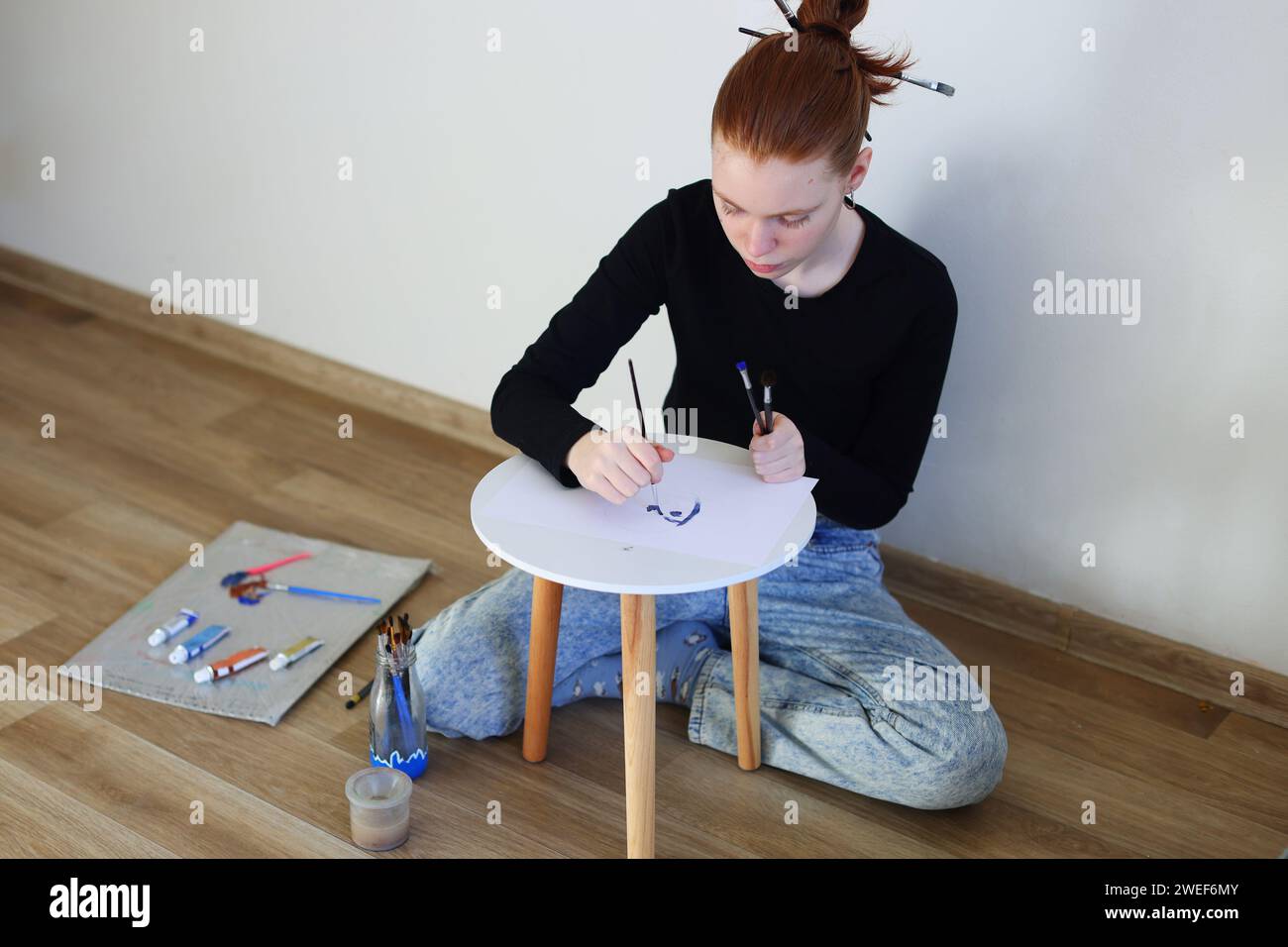Girl starts drawing concept hi-res stock photography and images - Alamy