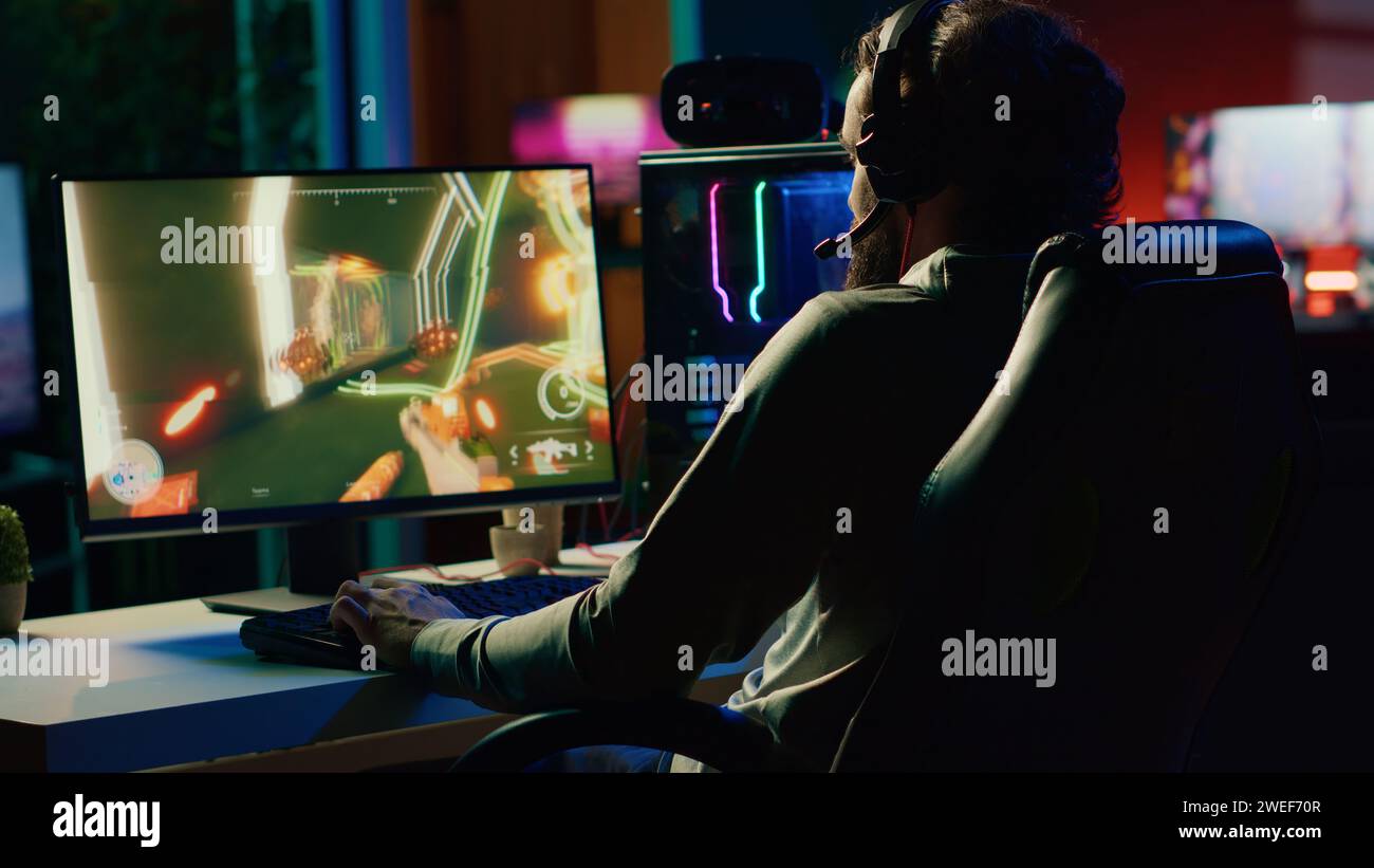 Player reaching final mission in coop FPS videogame, battling flying ...