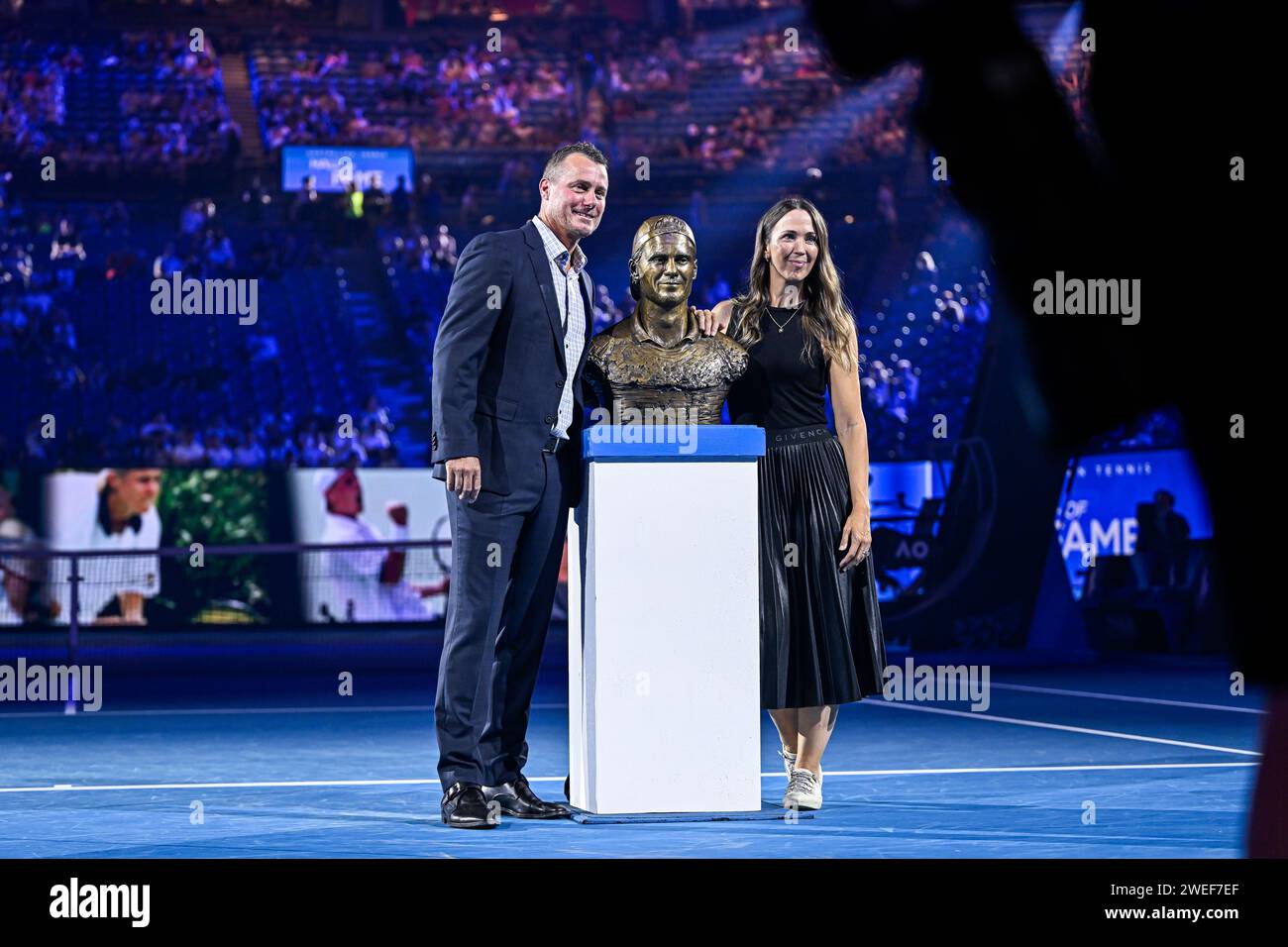 Lleyton Hewitt with his wife Bec Hewitt posing with a statue of himself ...