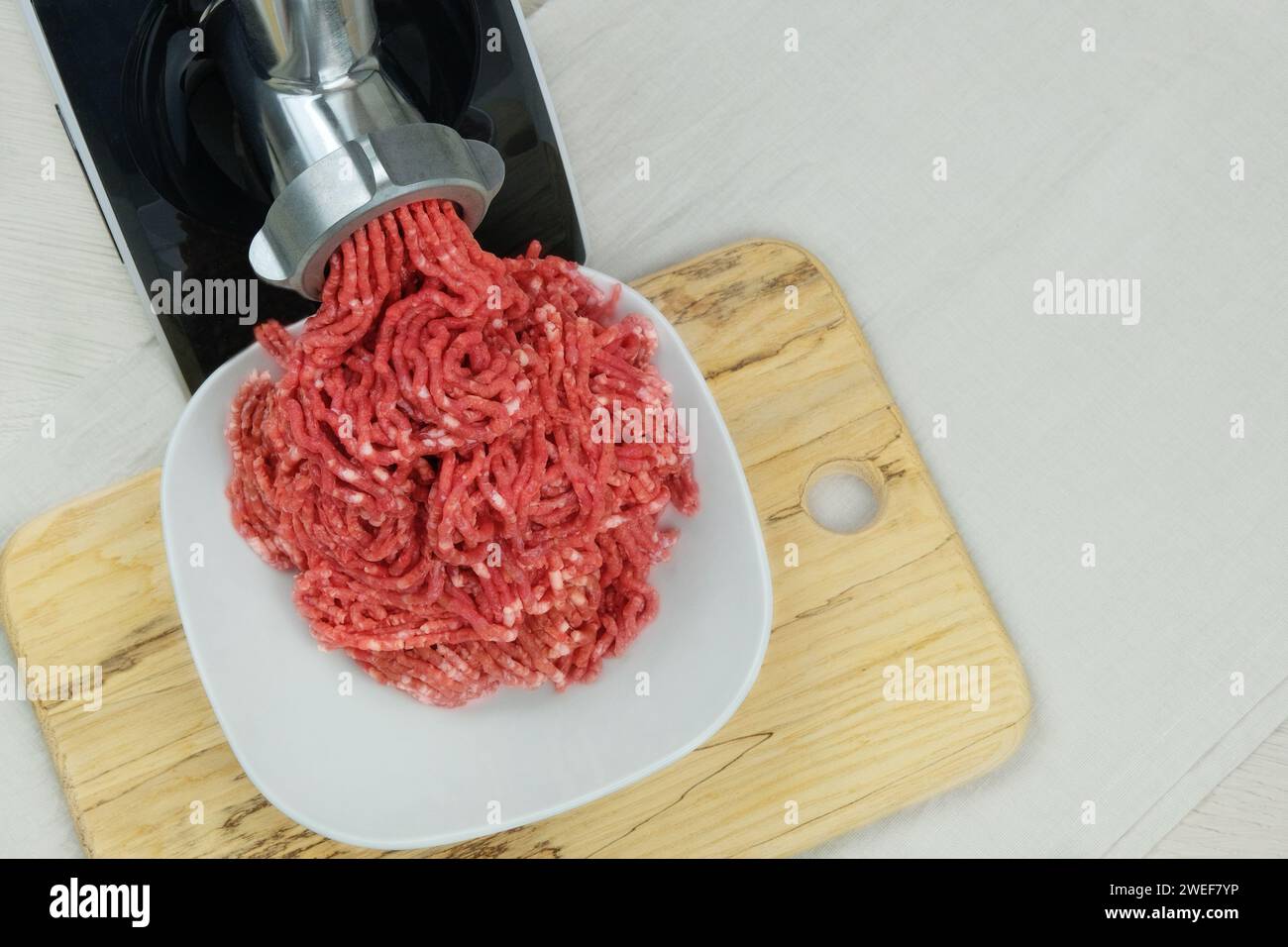 Minced meat comes out grinder hi-res stock photography and images - Alamy