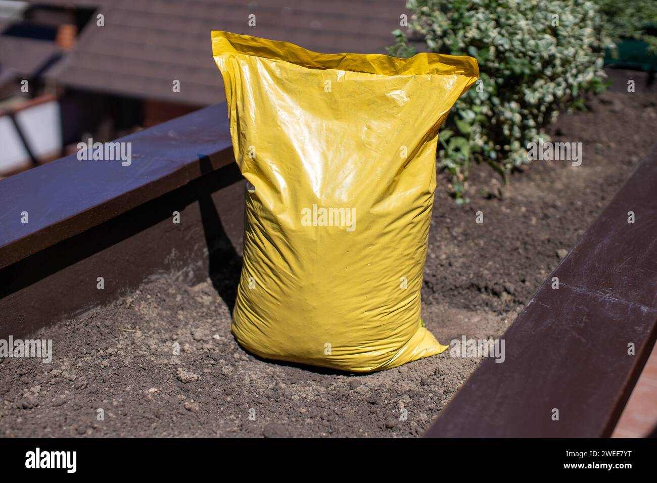 bag of gardening soil in jardiniere Stock Photo - Alamy