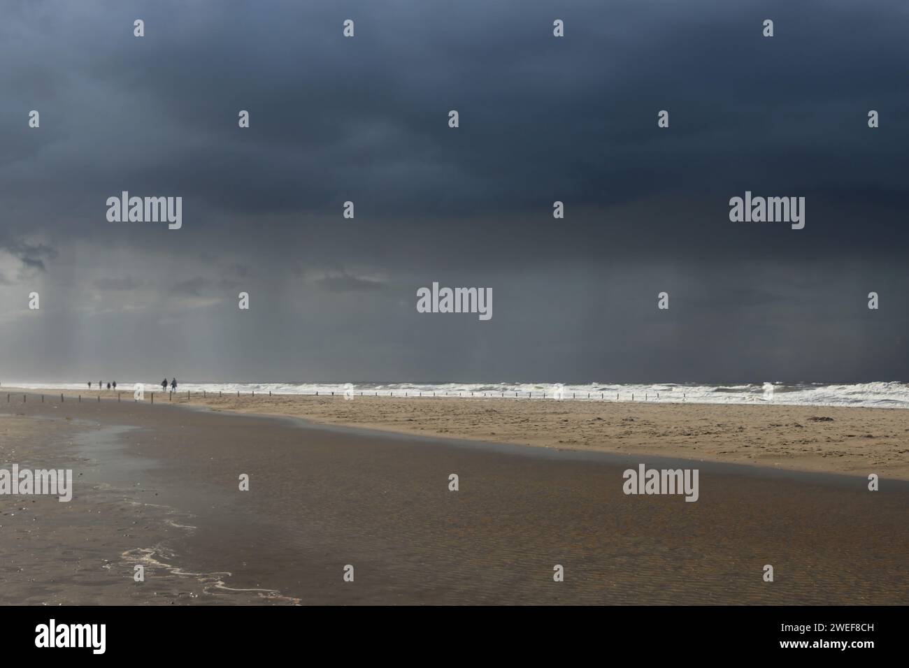 Rain on the Beach Stock Photo - Alamy