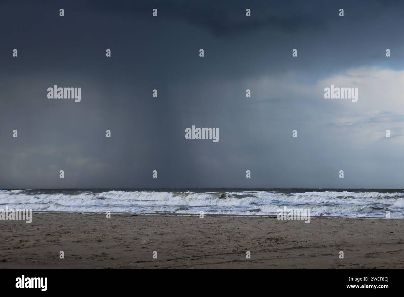 Rain on the Beach Stock Photo - Alamy