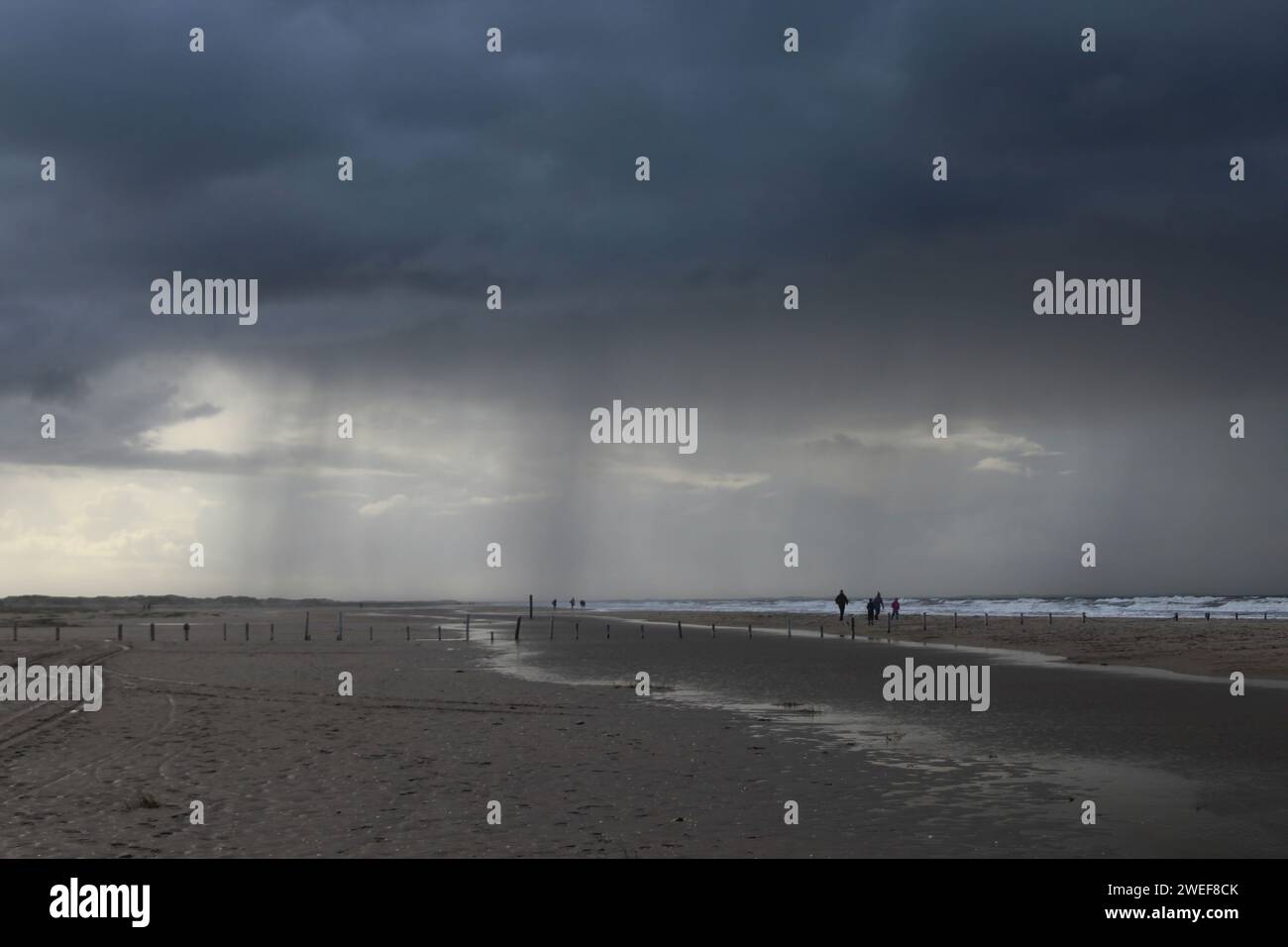 Rain on the Beach Stock Photo - Alamy