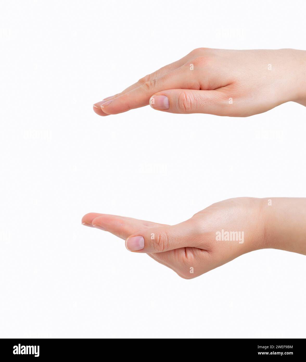 Woman hands with a protection gesture isolated on a white background ...