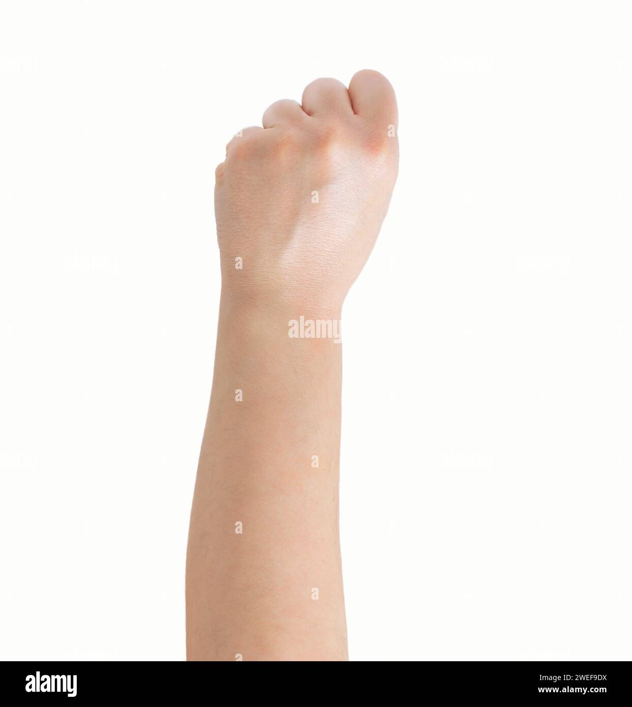 Woman fist up a white isolated background Stock Photo - Alamy
