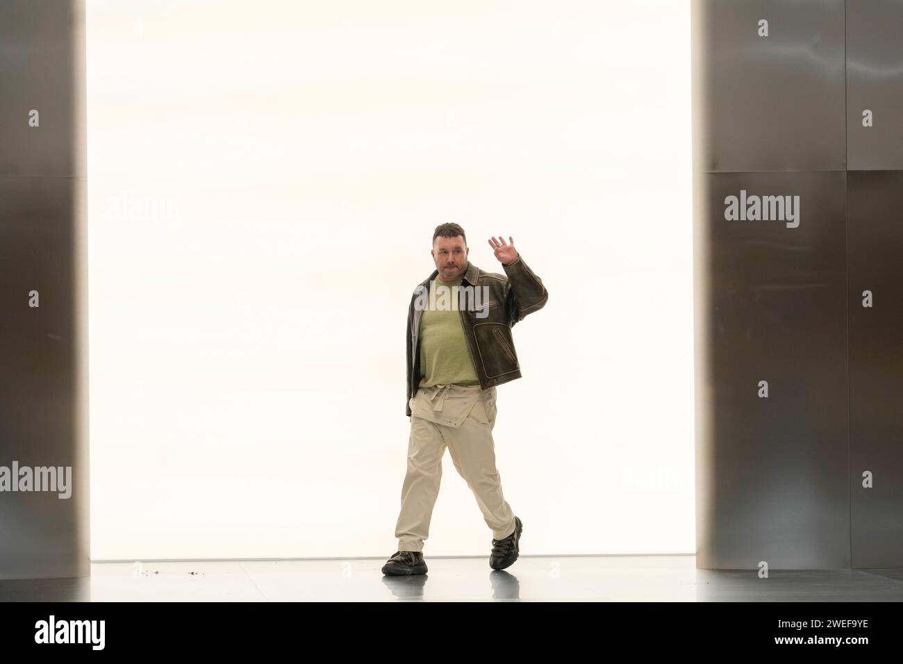 Designer Kim Jones accepts applause after the Fendi Haute Couture ...