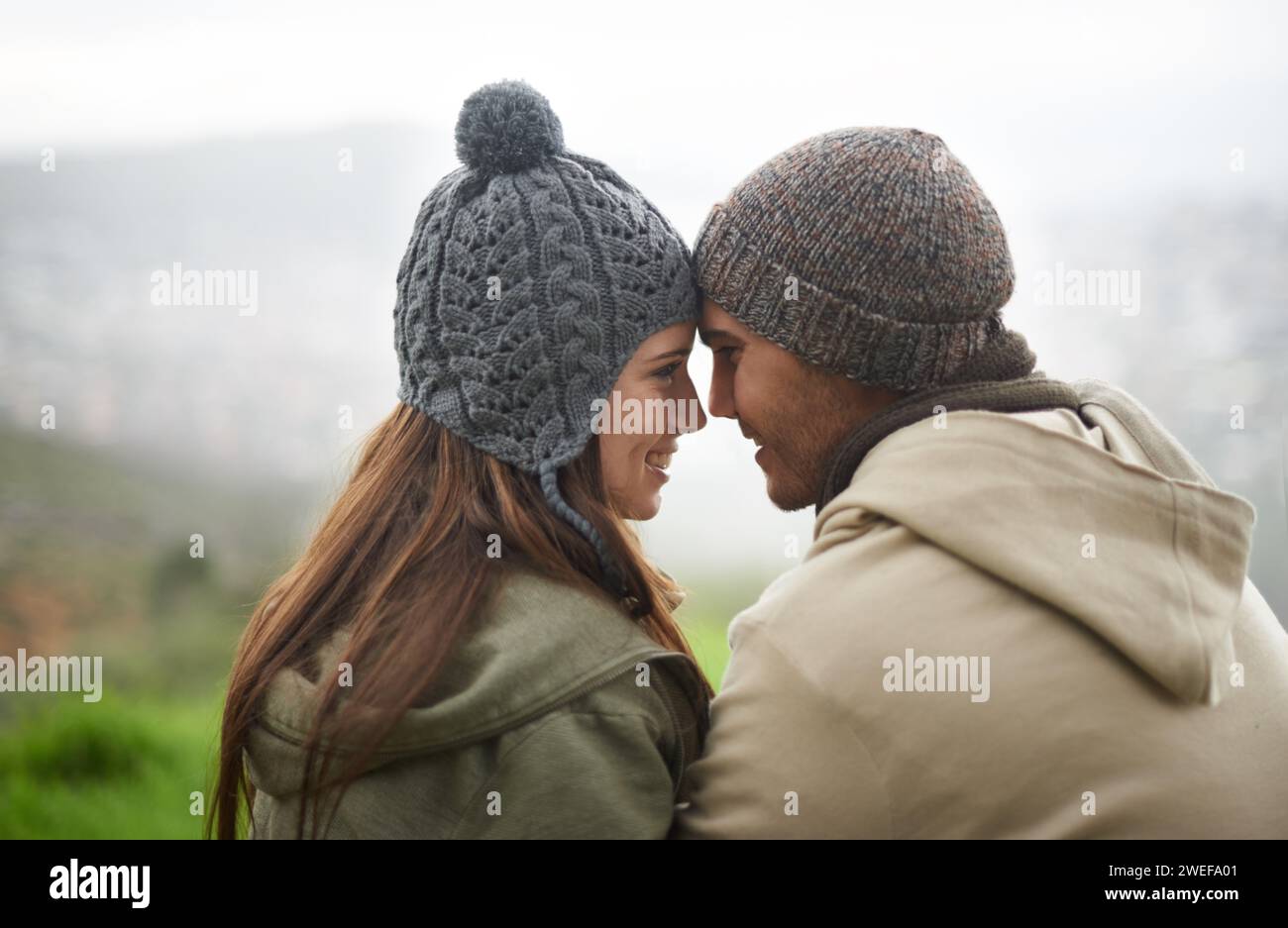 Love, forehead touch and happy couple on nature journey, travel ...