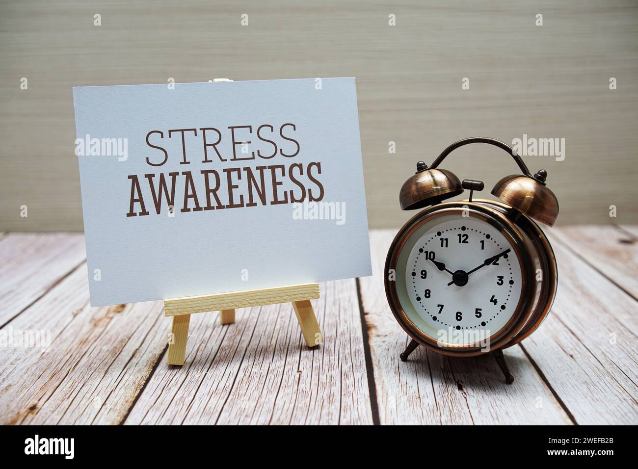 Stress Awareness word with alarm clock on wooden background Stock Photo ...