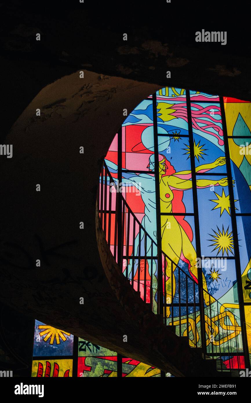 Stained glass art inside a big building showing a dualistic world of ...