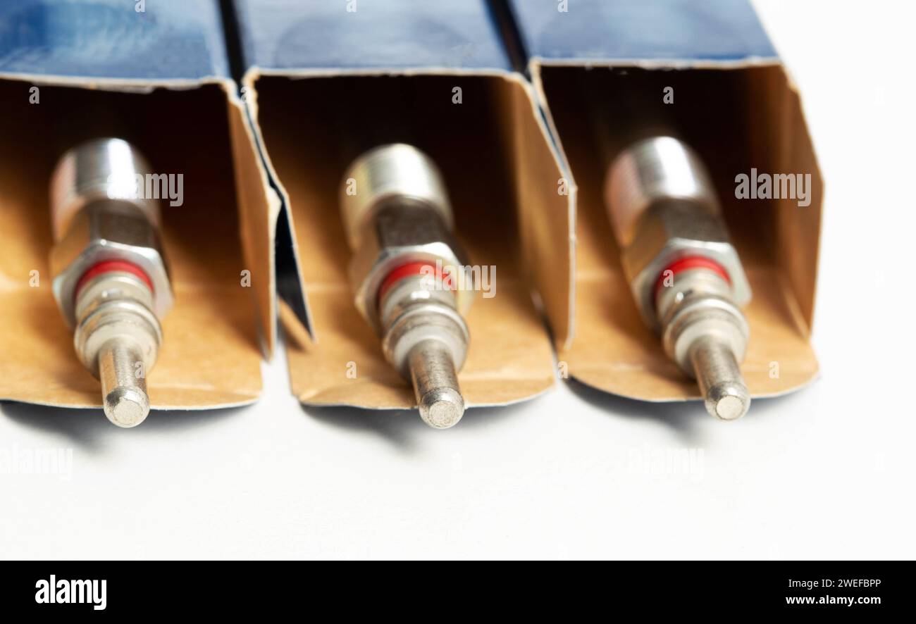New modern ceramic glow plugs in packaging on a white background ...