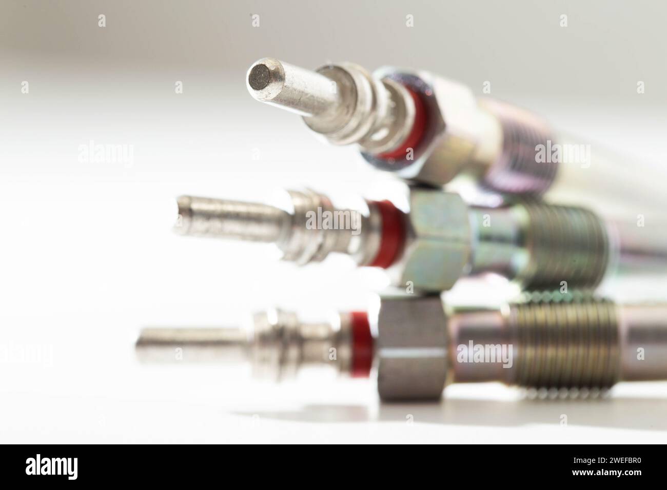 Modern ceramic glow plugs for warming up a diesel engine before ...