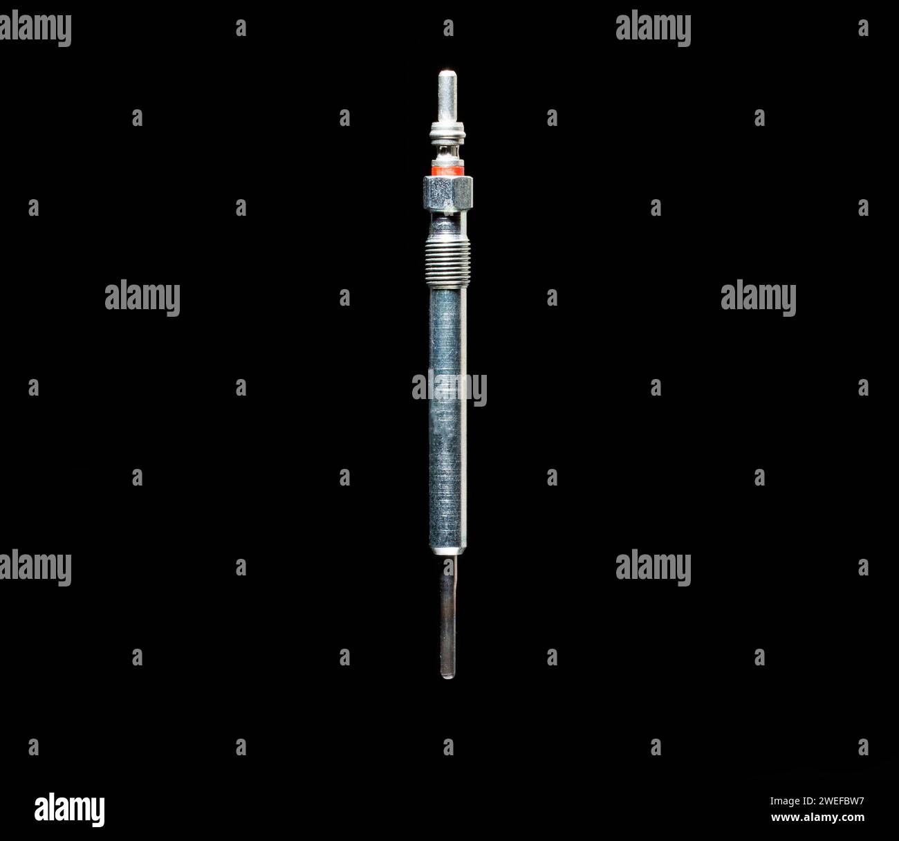 Modern glow plug with a ceramic rod for a diesel engine on a black ...