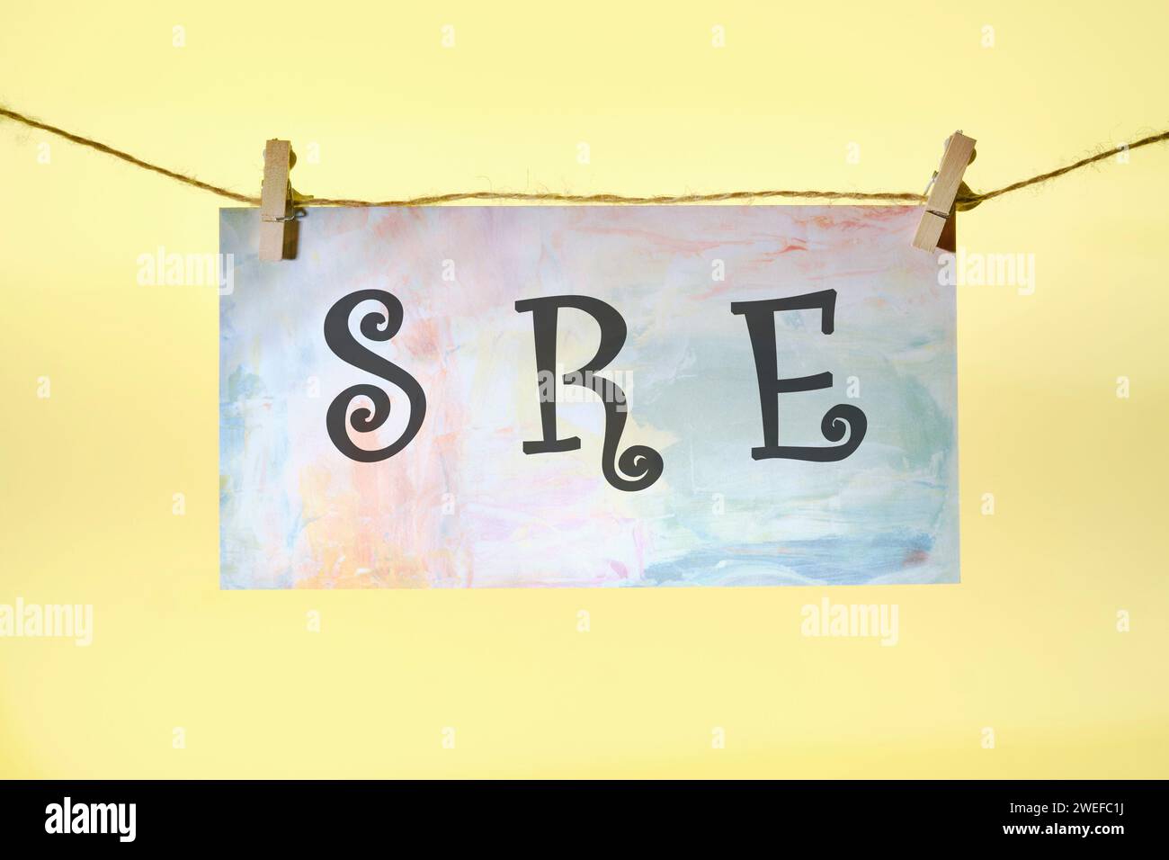 SRE. Site Reliability Engineering acronym concept on cubes and diagrams ...