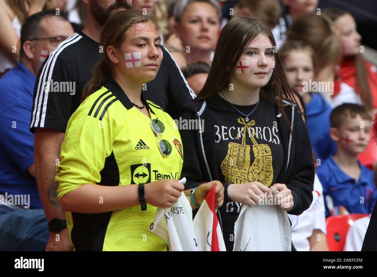 Female fans hold England flag with Russo and Toone names UEFA Women's ...