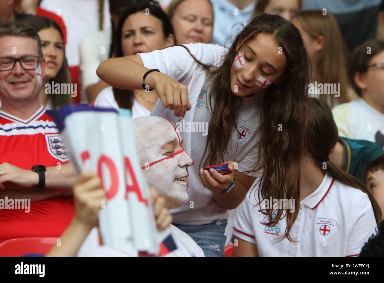 A bald fan has his head painted with St George's cross UEFA Women's ...