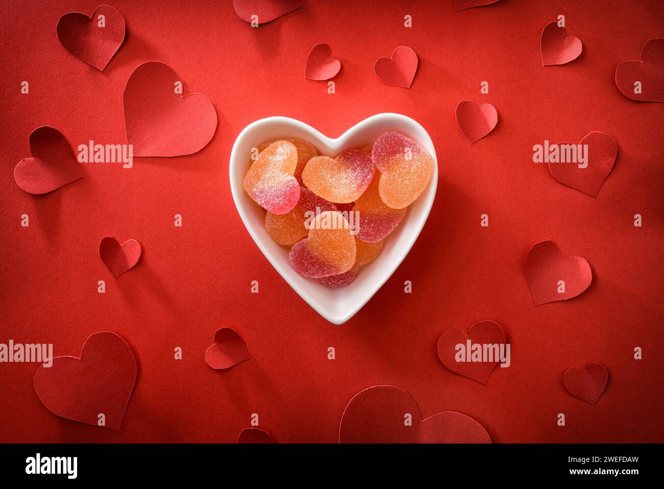 Conceptual love background with white ceramic container with heart ...