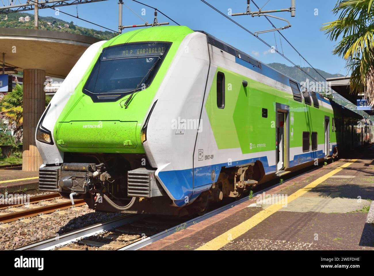 A Trenord class ETR.421 no. 421-039 pauses at Stresa station with a ...