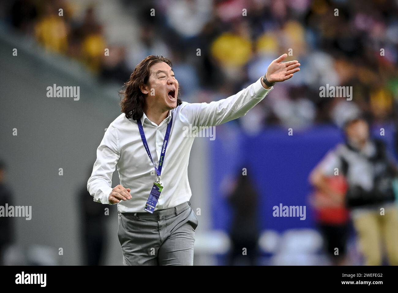 Doha. 25th Jan, 2024. Kim Pangon, head coach of Malaysia reacts during ...