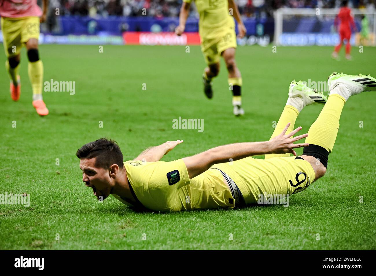 Doha. 25th Jan, 2024. Romel Morales of Malaysia celebrates after ...