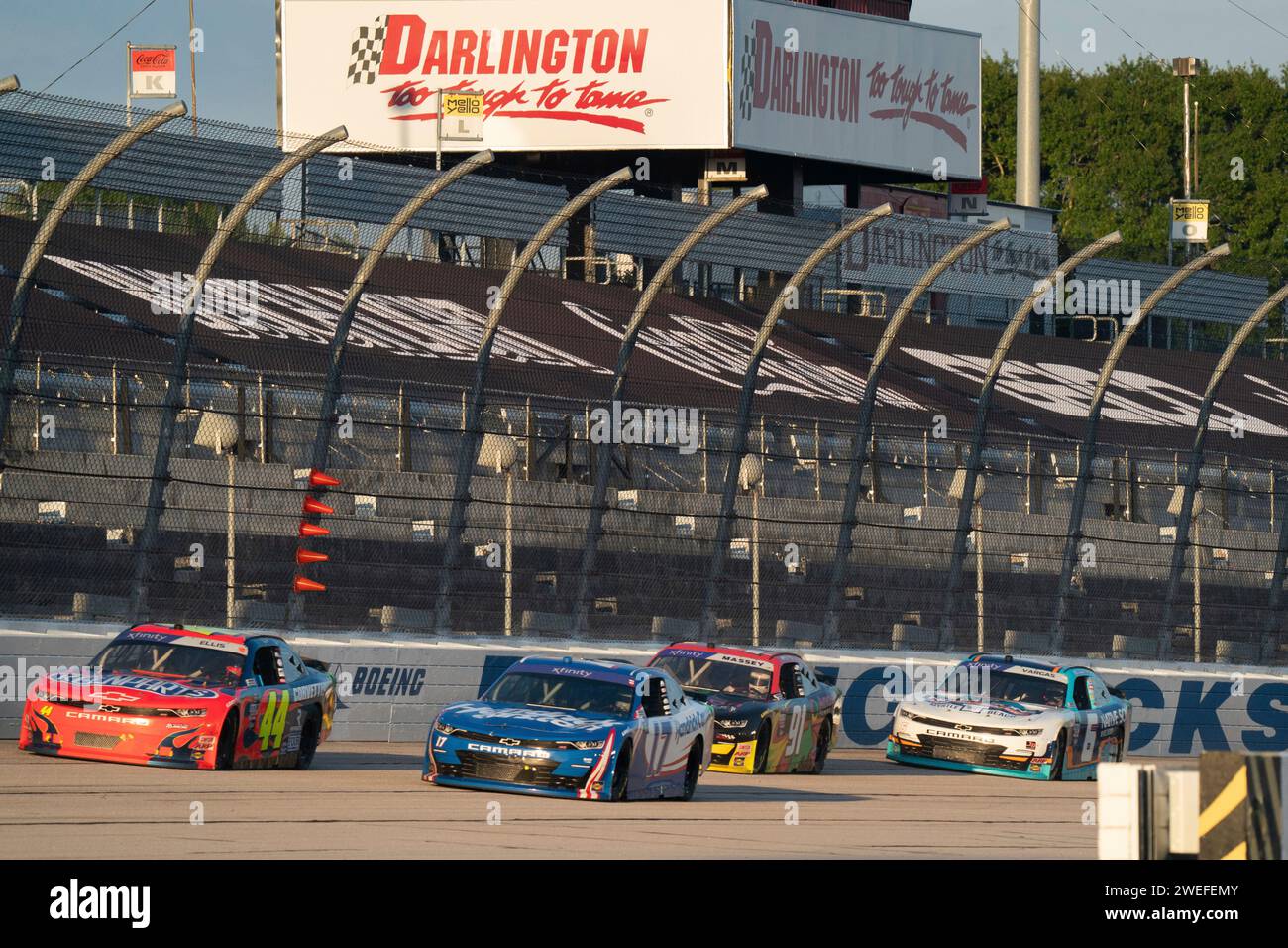 FILE - Ryan Ellis (44), Kyle Larson (17), Mason Massey (91), and Ryan ...