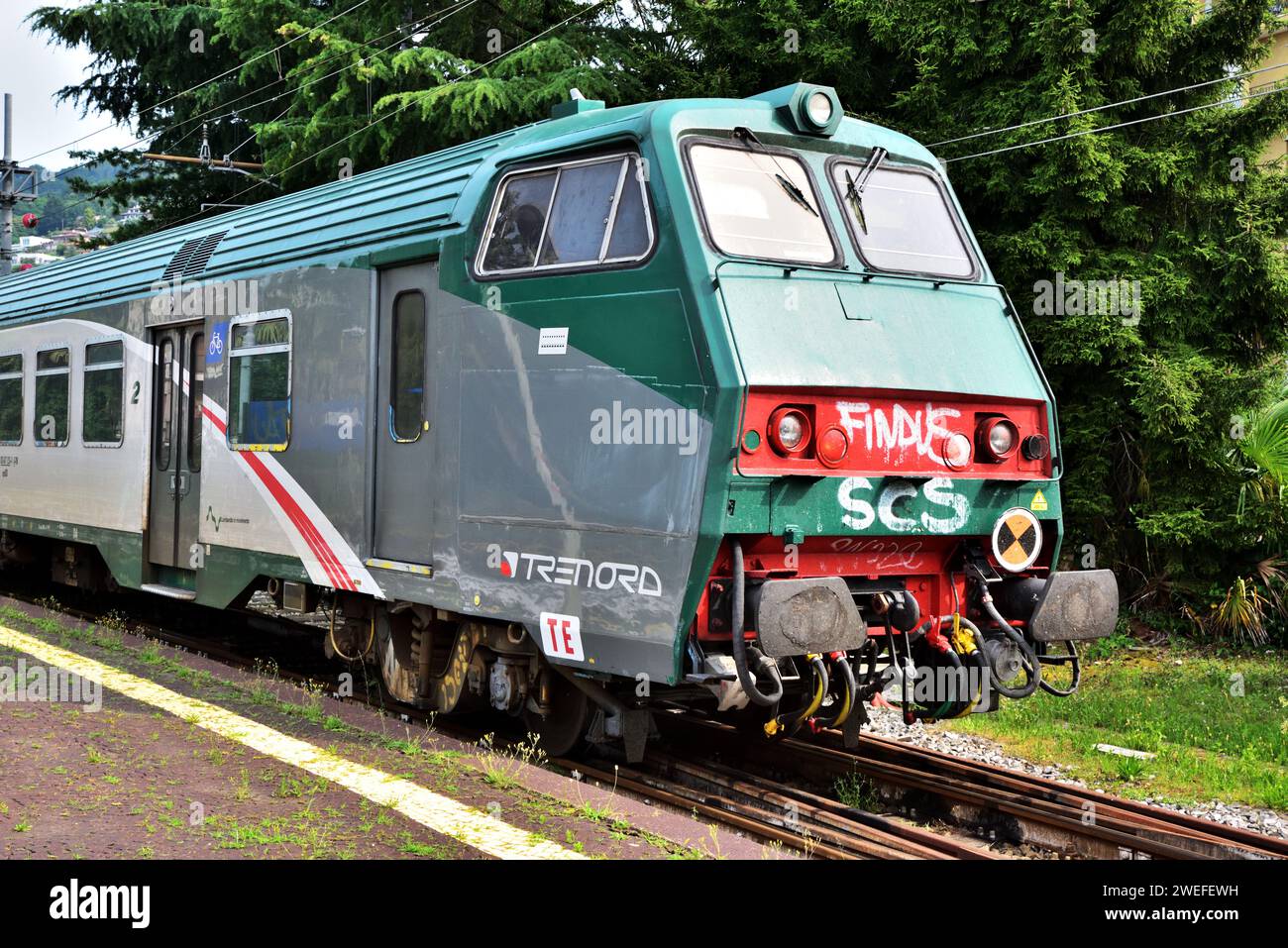 The driving trailer end of a Trenord push-pull unit is seen at Stresa ...