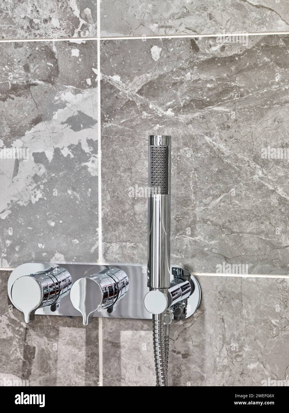 Shower head and controls Stock Photo - Alamy