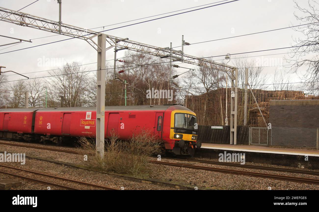 Lichfield, Staffordshire, England 25th January 2024 A class 325 train ...